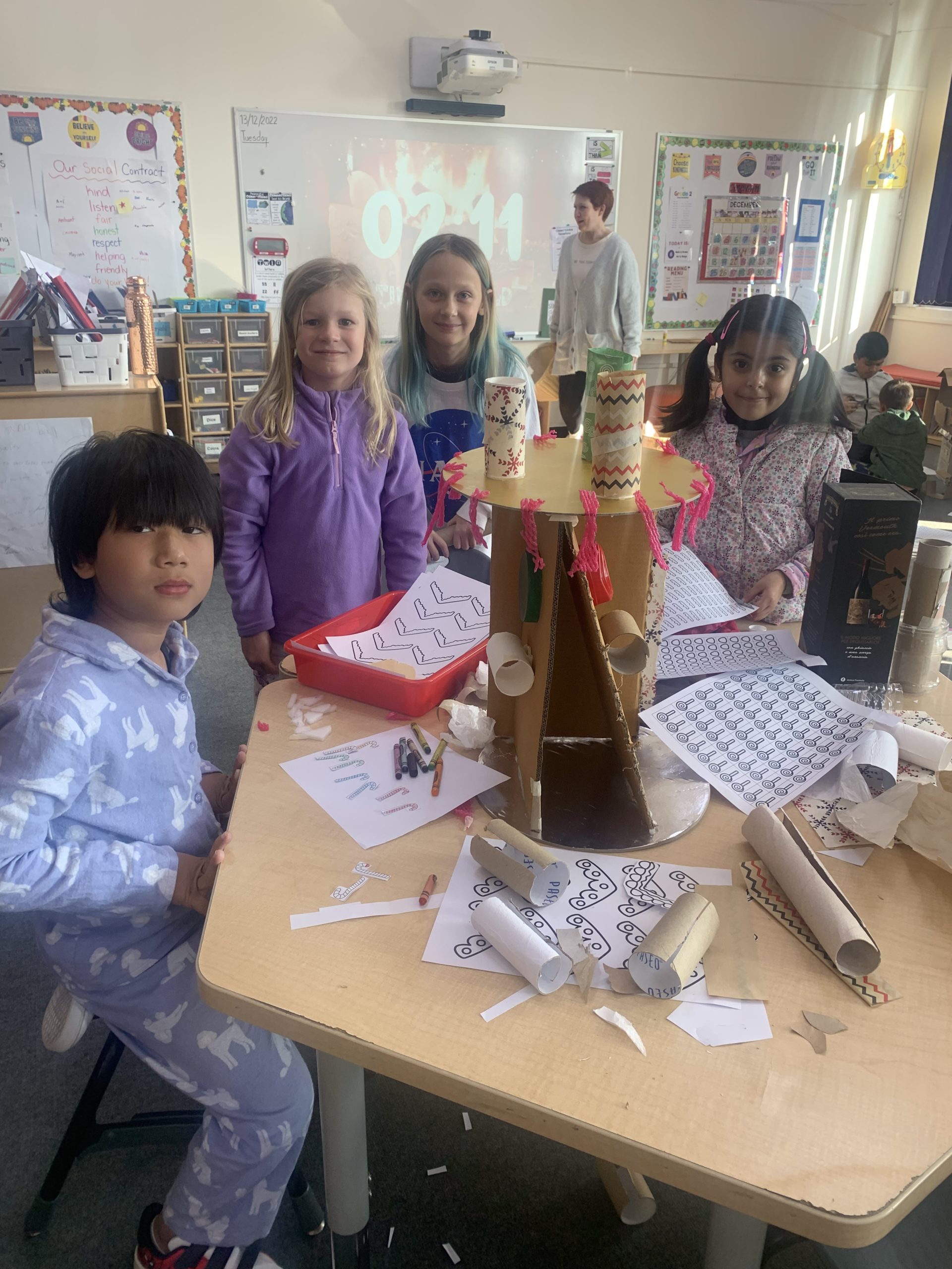 Buddies Build Gingerbread Houses - Lincoln School Nepal